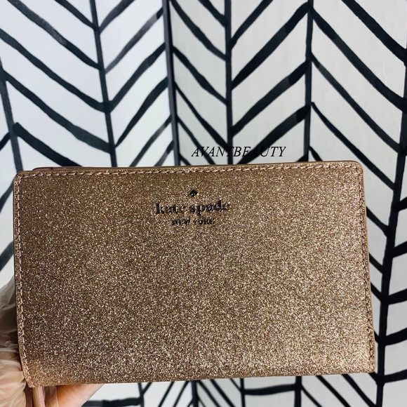 kate spade | Bags | Kate Spade Medium Bifold Wallet Rose Gold New ...